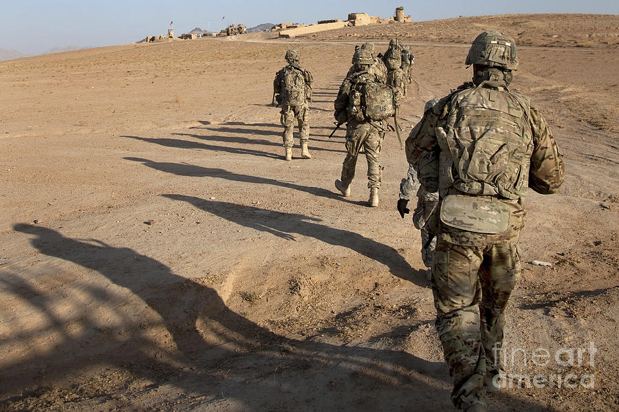 U.s. Army Soldiers Walk Photograph by Stocktrek Images