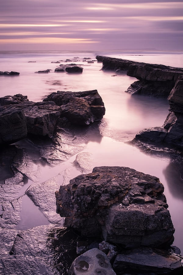 Beautiful toned seascape landscape of rocky shore at sunset Photograph ...