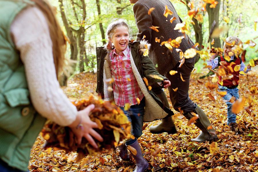 Family Playing In Autumn Leaves #1 Photograph by Science Photo Library ...