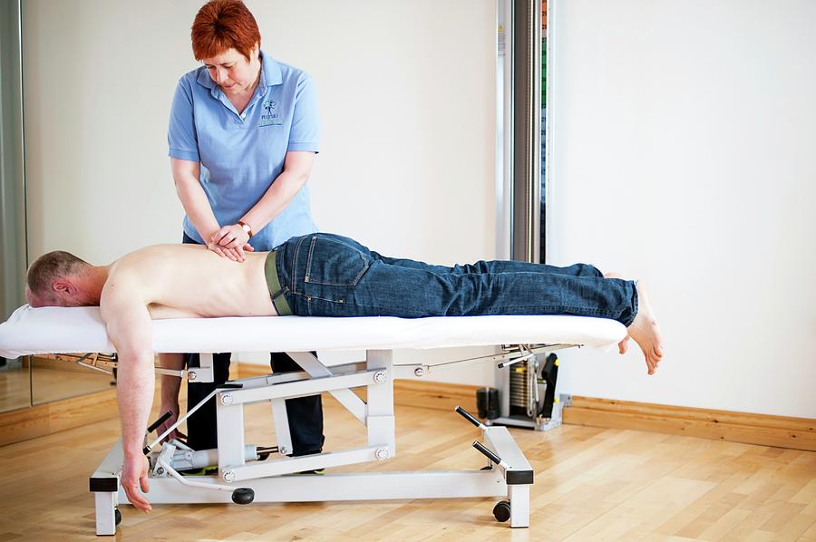 Physiotherapy Session #1 by Science Photo Library
