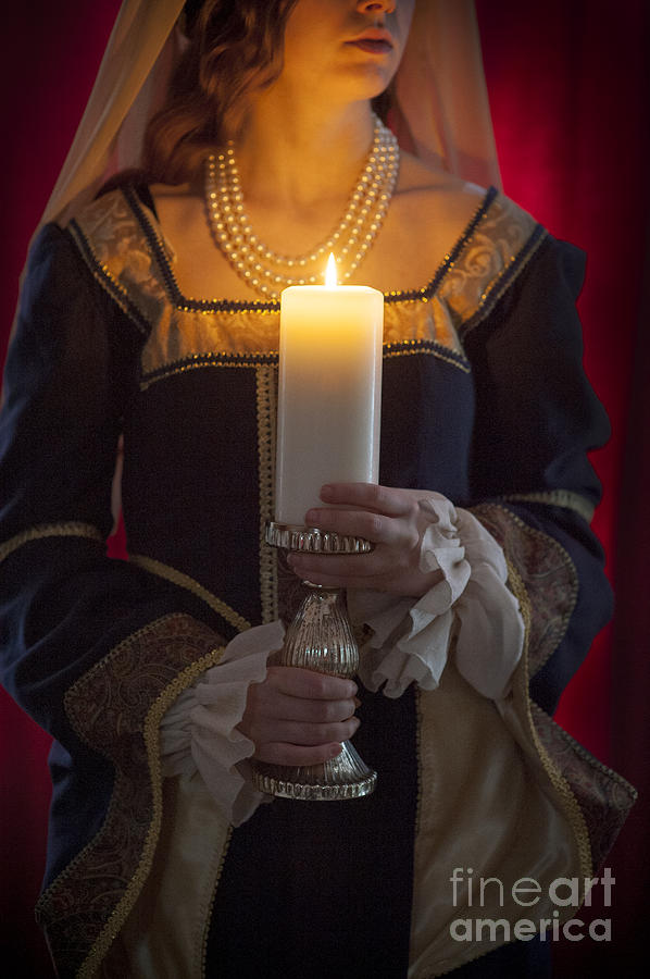 Woman In A Blue Medieval Dress Holding A Candle Photograph By Lee