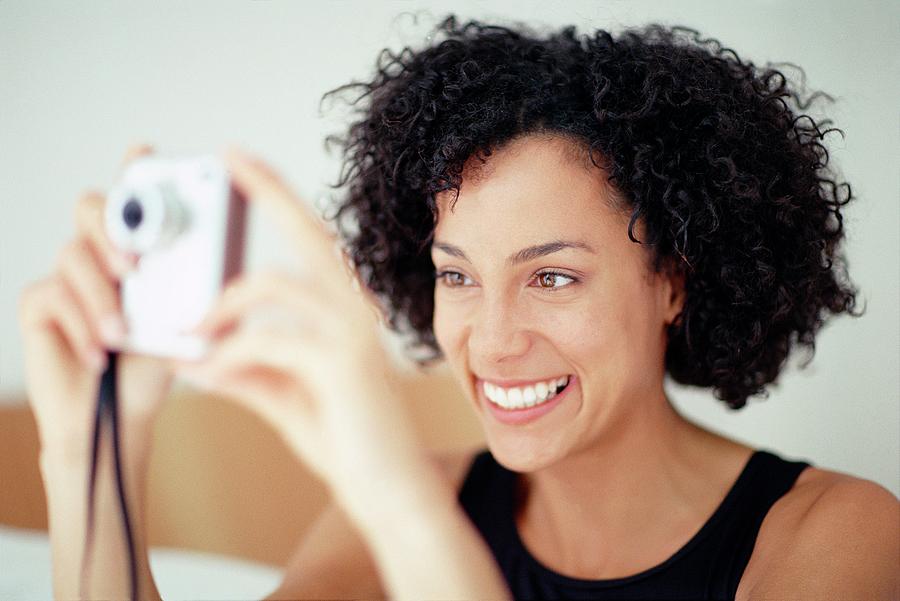 Woman Taking A Photograph Photograph By Ian Hooton Science Photo
