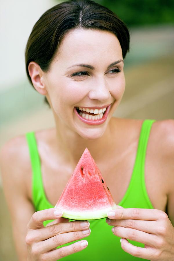 Woman Eating Watermelon 2 By Ian Hooton Science Photo Library