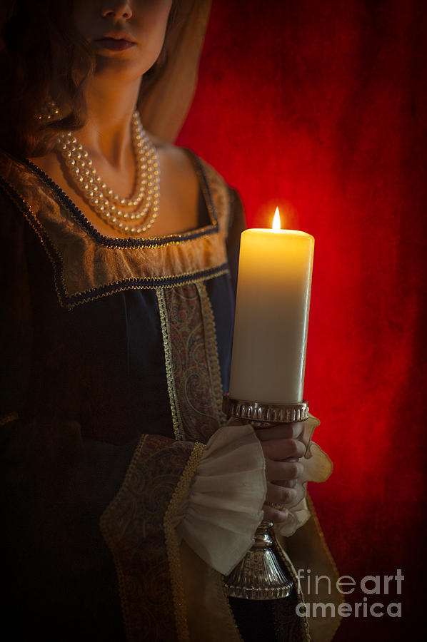 Woman In A Blue Medieval Dress Holding A Candle Photograph By Lee