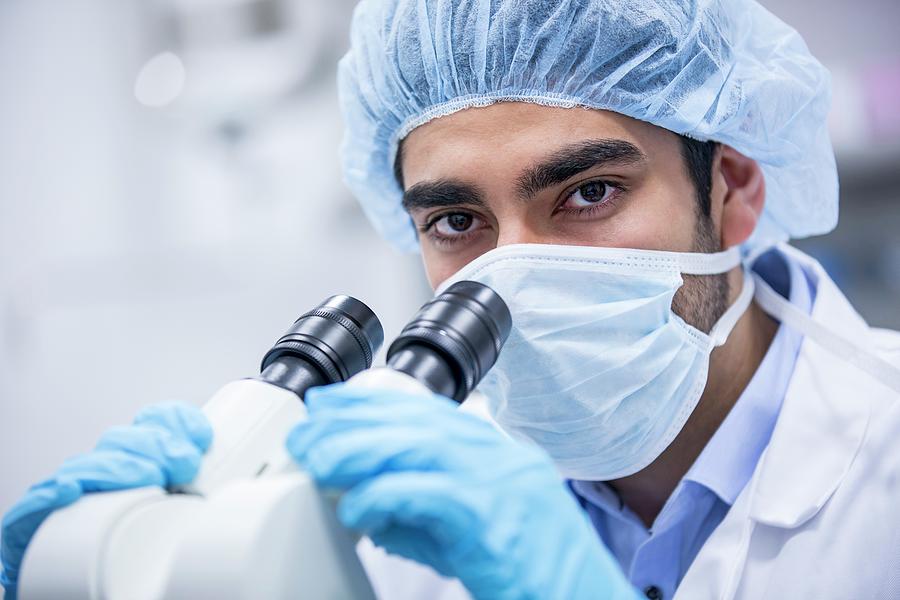 Scientist Using Microscope Photograph by Science Photo Library - Fine ...