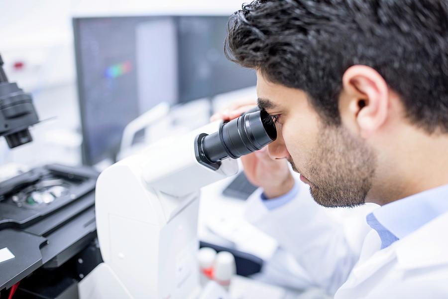 Scientist Using Microscope Photograph by Science Photo Library - Fine ...