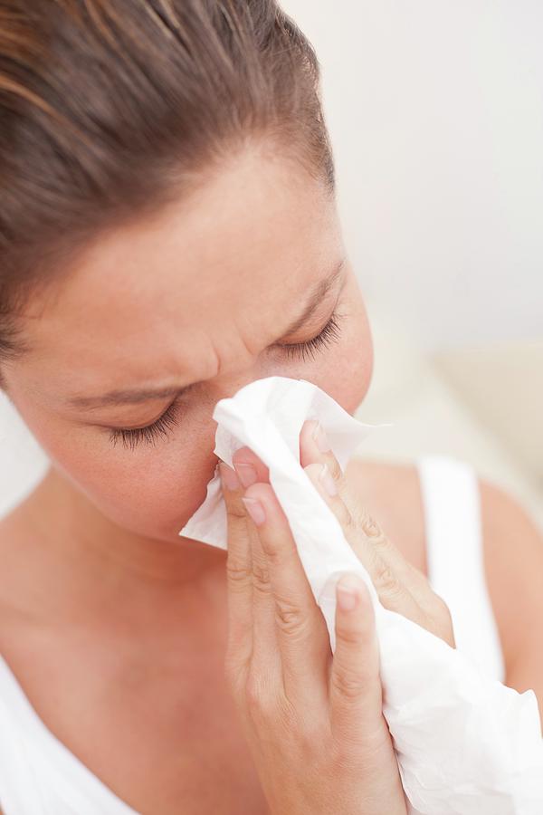 Woman Blowing Nose On Tissue Photograph by Science Photo Library - Fine ...