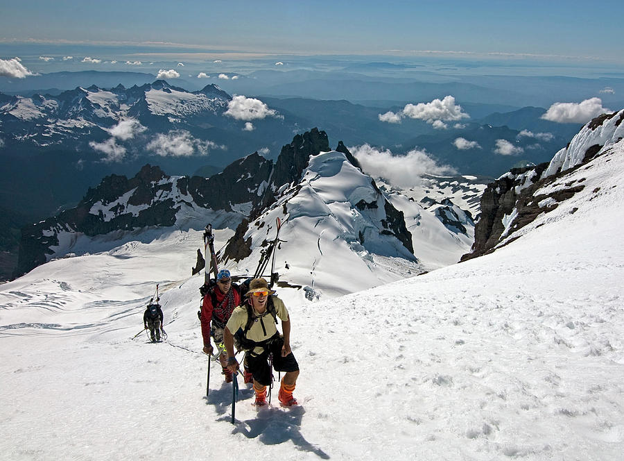 A Father And Son Climb The Upper Slopes Photograph by Cliff Leight - Pixels