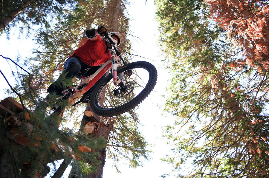 A Mountain Biker Splashed In Fall Photograph by Bud Force - Pixels