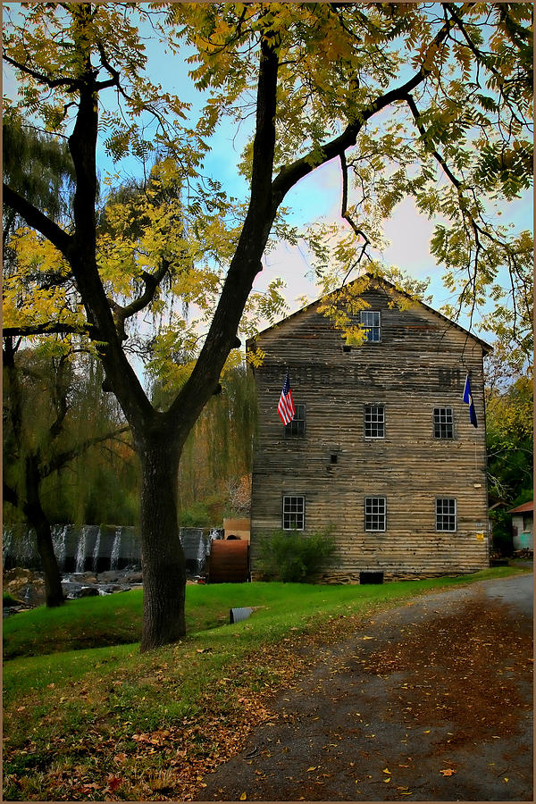 Brightwells Mill with Flags Photograph by Rebecca Raybon - Pixels