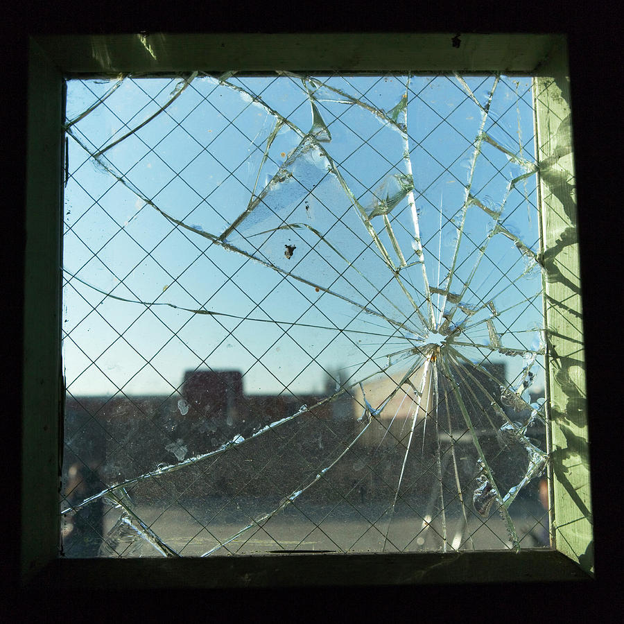Cracked Window Photograph by Ron Koeberer
