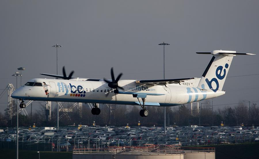 Dash 8 Photograph by Martin Jones | Fine Art America