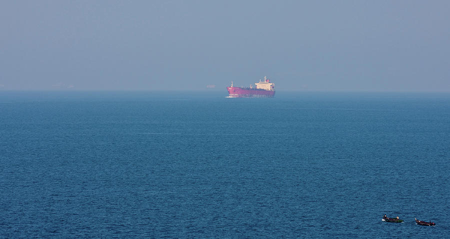 Distant View Of Container Ship In Sea Photograph by Panoramic Images ...