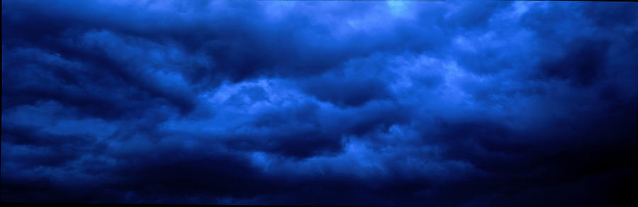 Dramatic Blue Clouds Photograph by Panoramic Images - Fine Art America