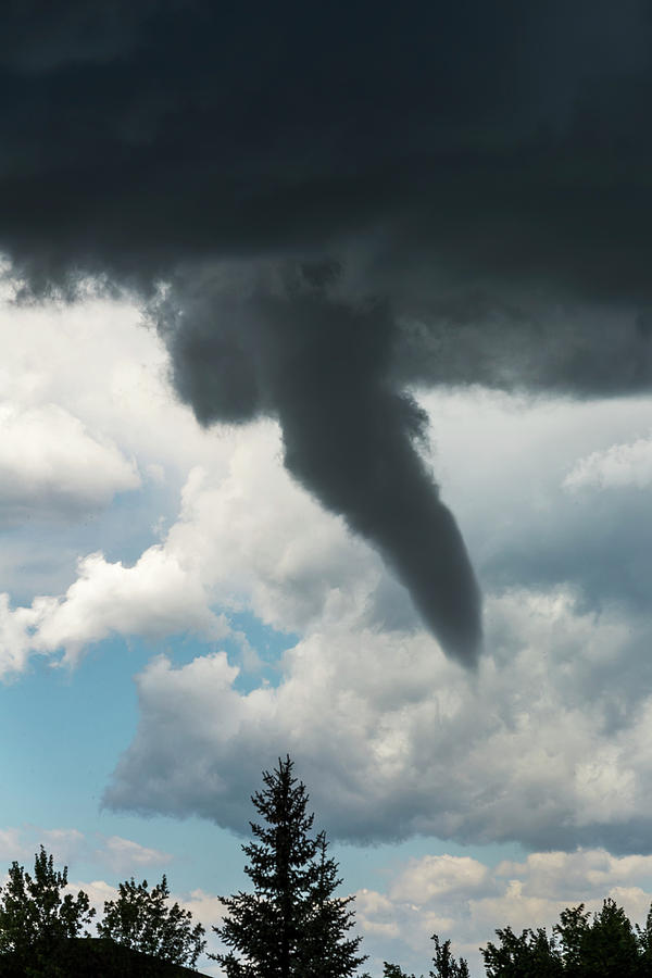 Dramatic Funnel Cloud Created In Dark Photograph by Michael Interisano