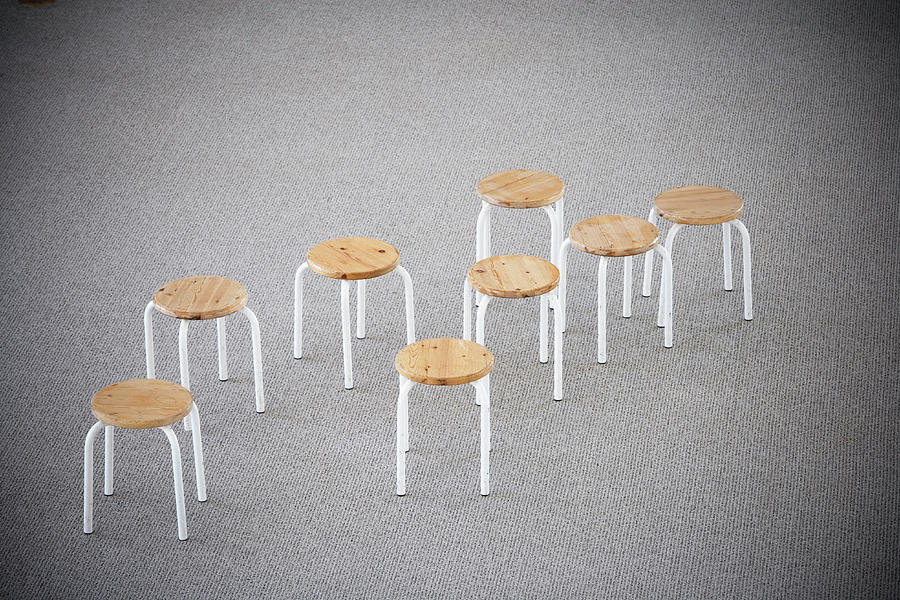 Empty Stools On Carpet Photograph by Ron Koeberer - Fine Art America