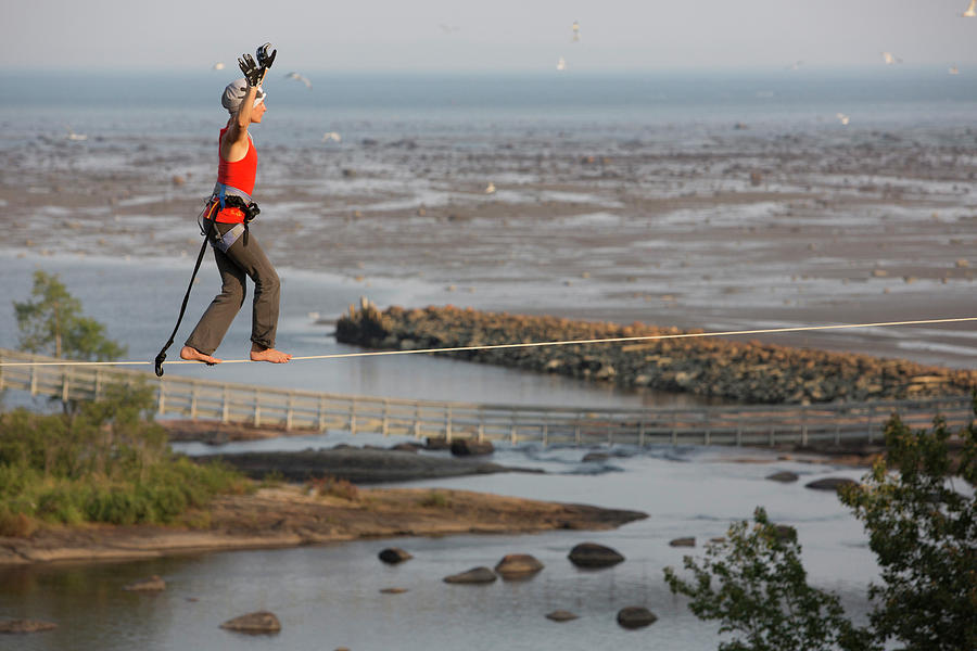 Female Slackliner Walks A Highline Photograph by Jared Alden - Pixels