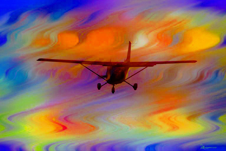 Flying Into A Rainbow Photograph by Ericamaxine Price