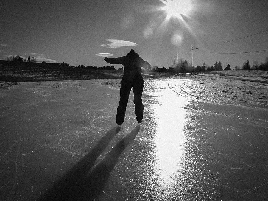 Ice scating Photograph by Isabelle Hansen - Pixels