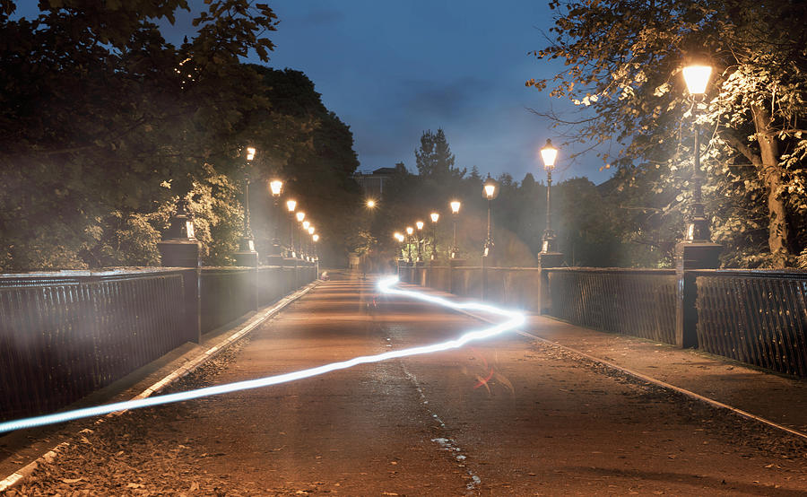 Light Trail Glowing In A Path Lit Photograph by John Short - Fine Art ...