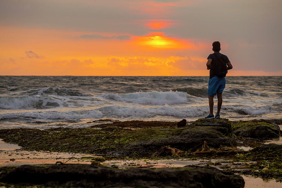 Man At Ocean Coastline At Sunset Photograph by Konstantin Trubavin - Fine Art America