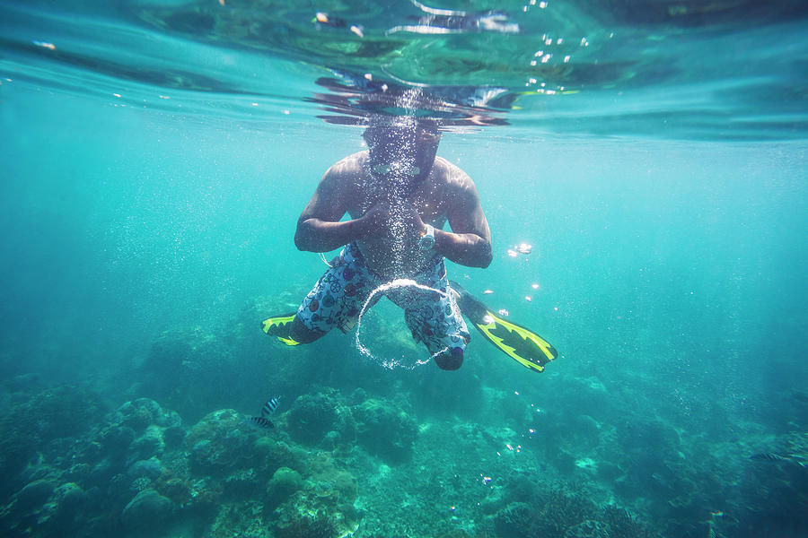 Man Snorkeling In The Ocean Photograph by Konstantin Trubavin - Fine Art America