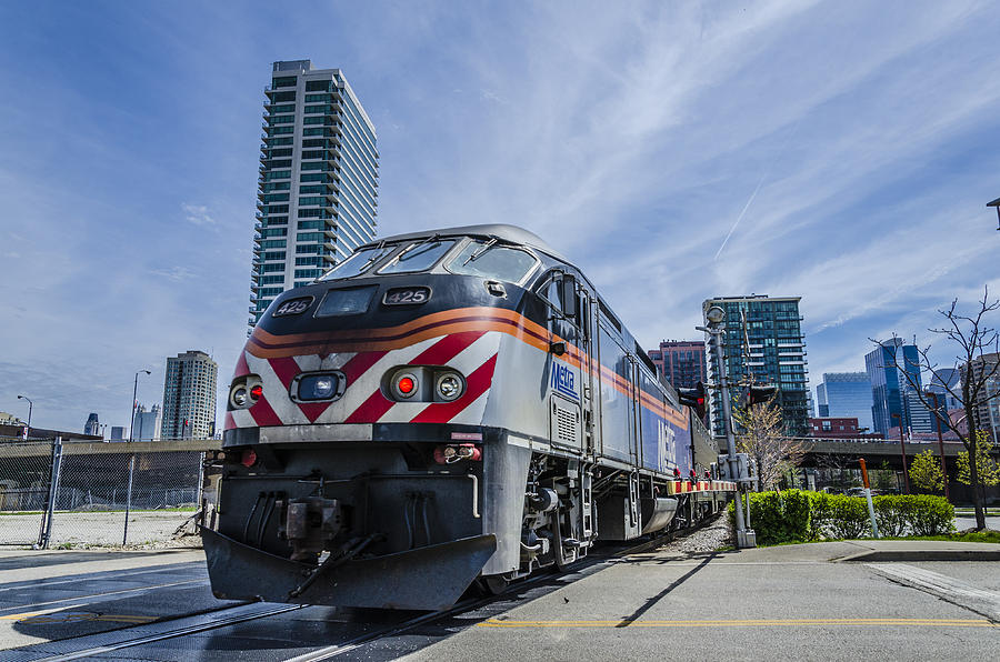 Metra leaving Photograph by Thomas Visintainer - Pixels Merch
