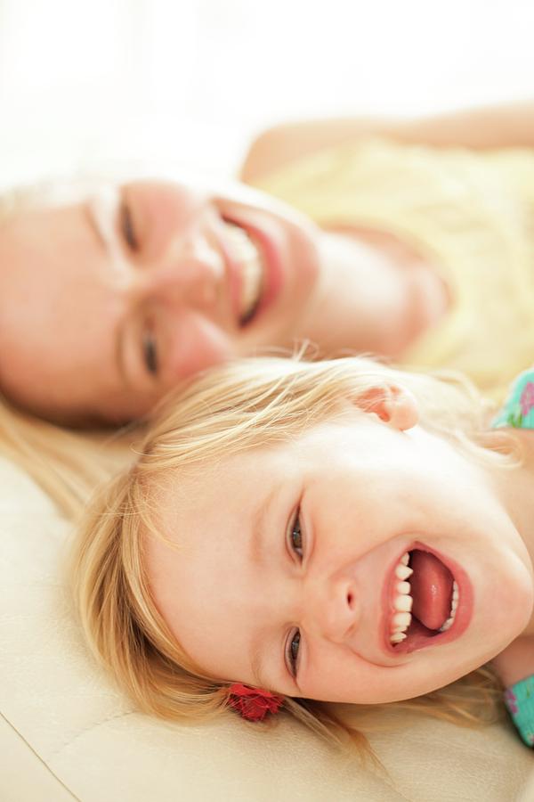 Mother And Her Daughter Laughing Photograph By Ian Hooton Fine Art
