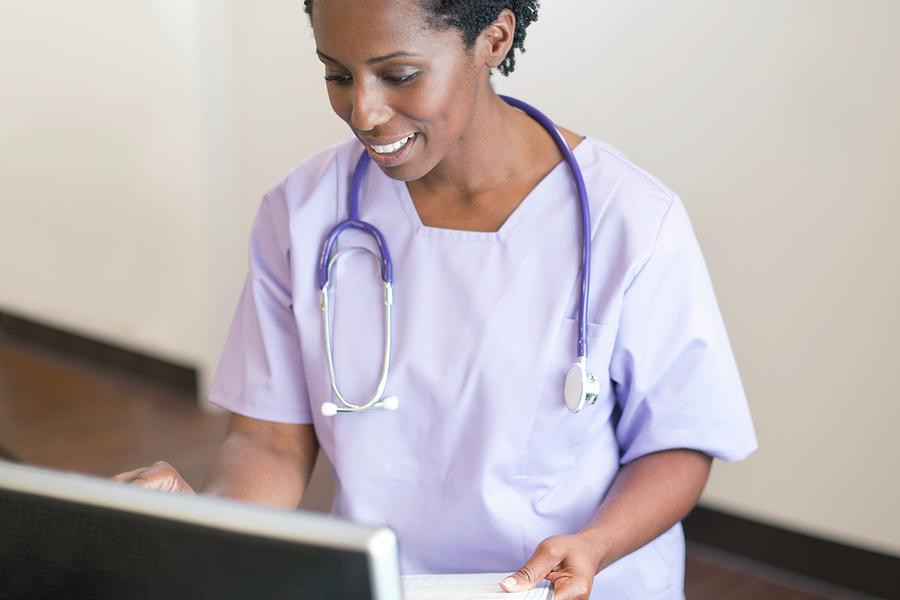 Nurse Using Computer Photograph by Science Photo Library - Pixels
