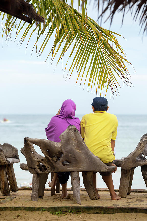 Rear View Of A Couple Sitting On Bench Photograph by Konstantin Trubavin - Fine Art America