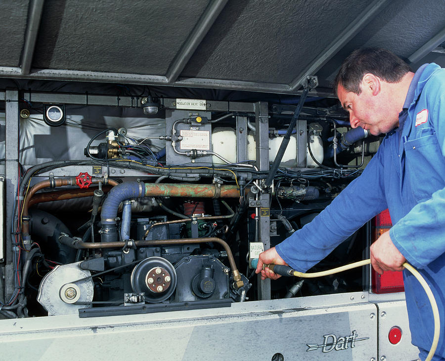 Refuelling Of A Bus Powered By Natural Gas Photograph by Martin Bond ...