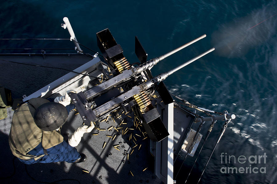 Seaman Fires Twin .50 Caliber Machine by Stocktrek Images