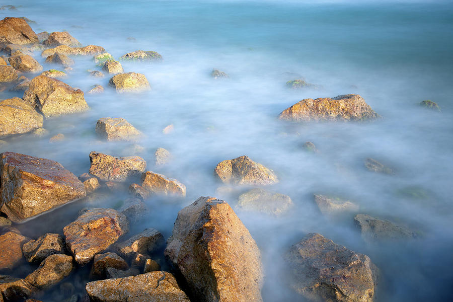 Stones In Sea by Michele Berti