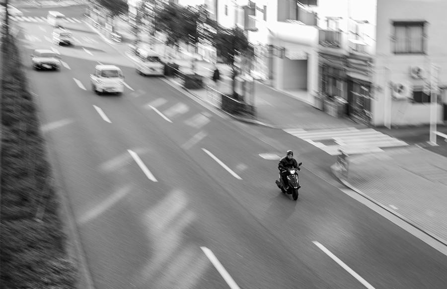 Sumida Biker Photograph by Ryan Routt - Fine Art America