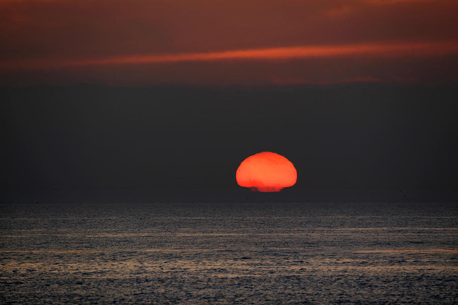 Sun Sinking Into Ocean Photograph by K.C. Alfred - Fine Art America