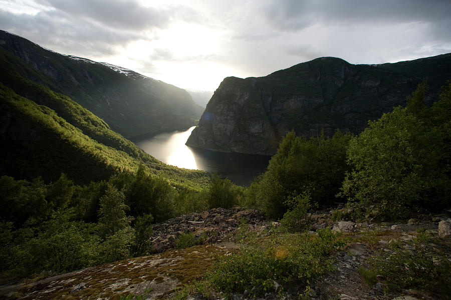 Sunlight Flows Through Light Clouds Photograph by Jose Azel