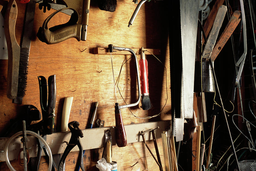 Sunlight On Old Tools Hanging Photograph by Ron Koeberer - Pixels