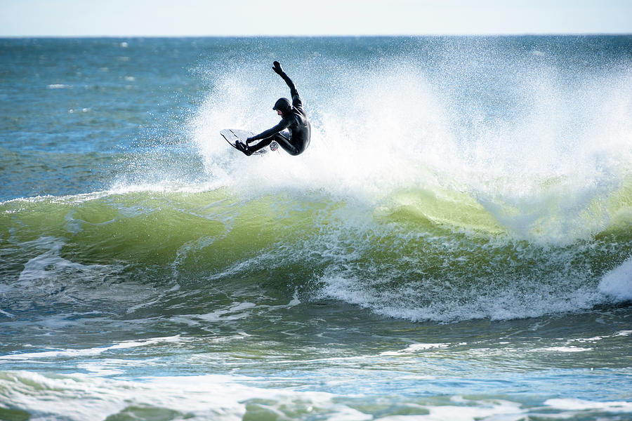 Surfer In Mid-air Above Wave Photograph by Cate Brown - Fine Art America