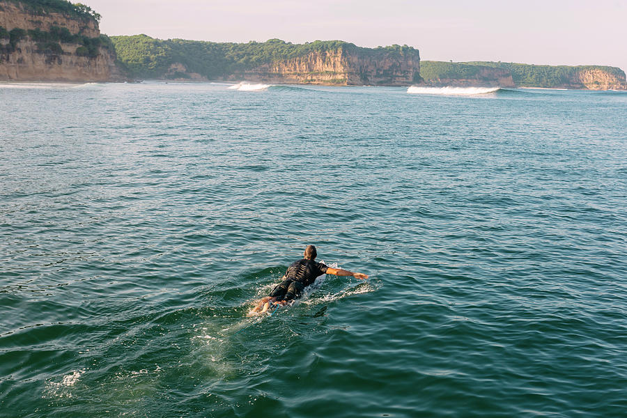 Surfer In Ocean,lombok,indonesia Photograph by Konstantin Trubavin - Fine Art America