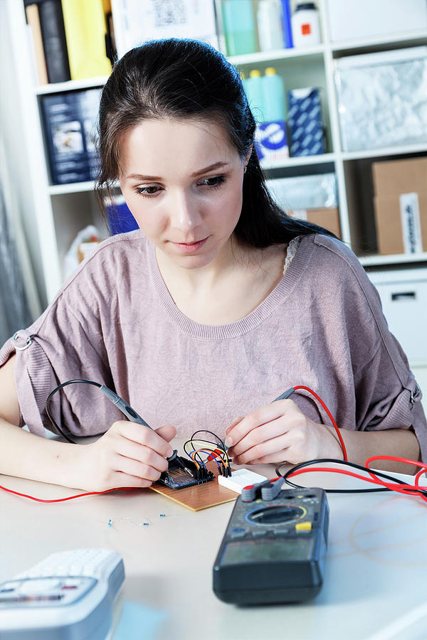 Technician Soldering Wires On Multimetre Photograph by Wladimir Bulgar ...