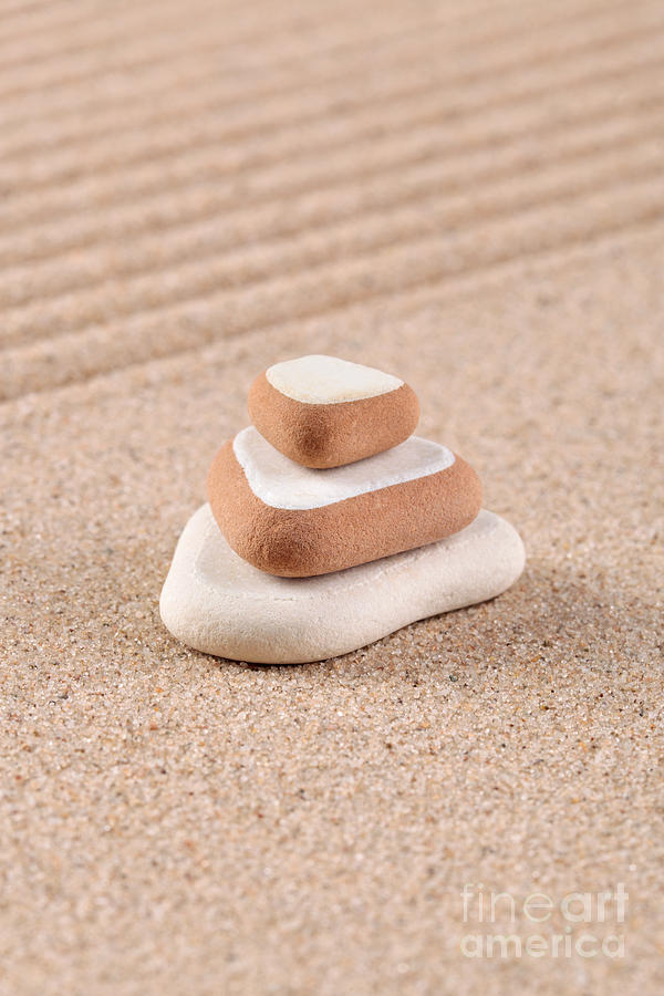 Three stone stack on raked sand. Photograph by Richard Thomas - Fine ...