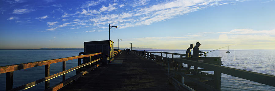 Tourists Fishing On A Pier, Goleta Photograph by Panoramic Images - Pixels