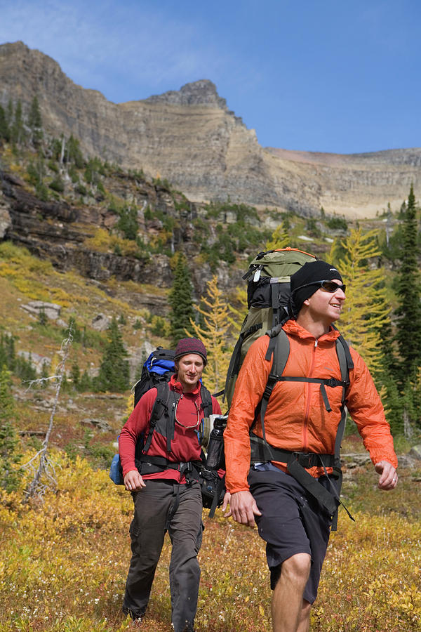 Two Backpackers Make There Way Photograph by Heath Korvola - Fine Art ...