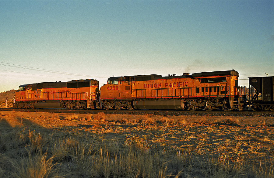 UP Diesels in the Mojave at sunset Photograph by Duncan Mackie - Pixels