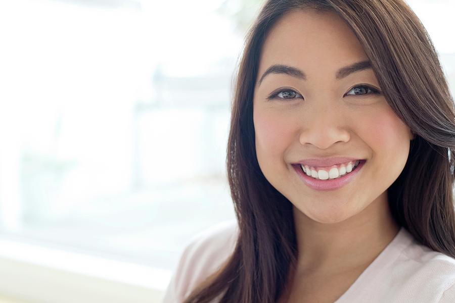 Woman With Brown Hair Smiling Towards Camera Photograph by Science ...