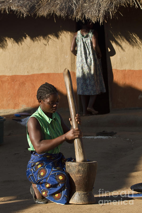 Woman with mortar Photograph by Lucas Guardincerri - Fine Art America