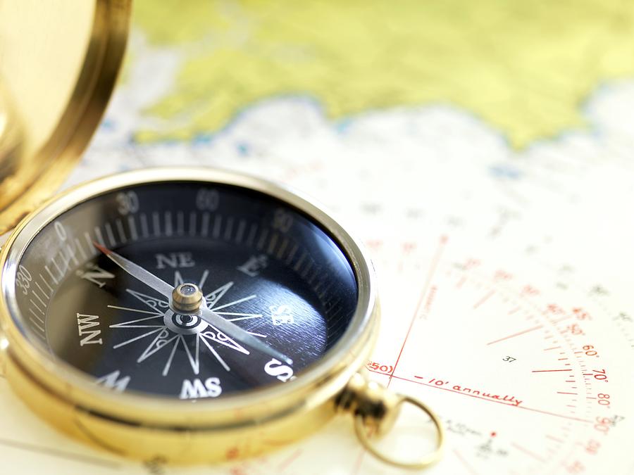 Compass On A Map #1 by Science Photo Library