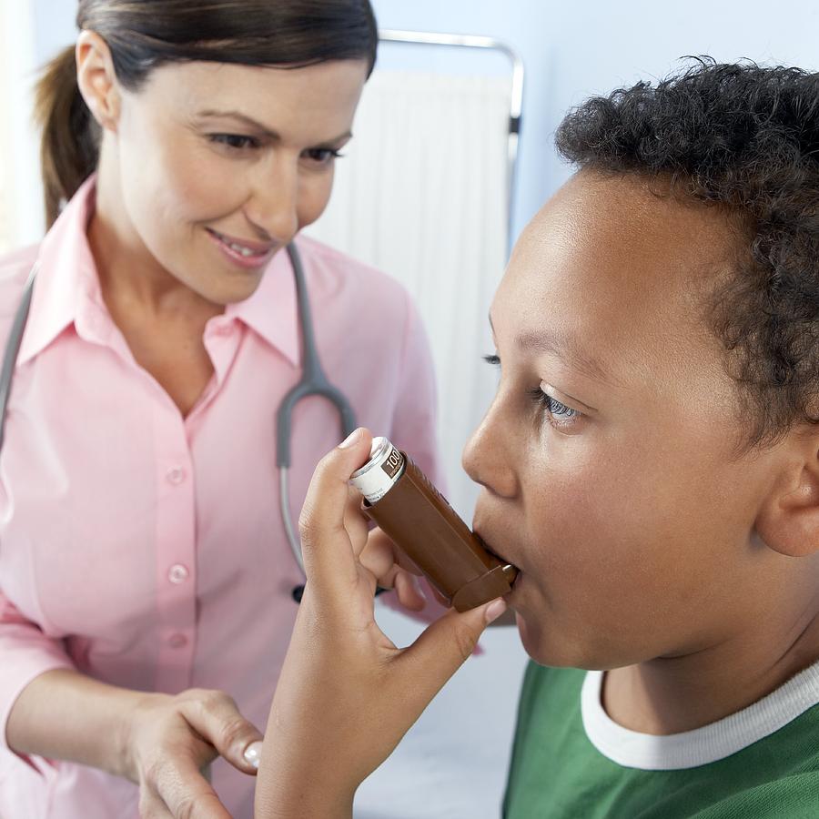 Using Asthma Inhaler #2 by Science Photo Library