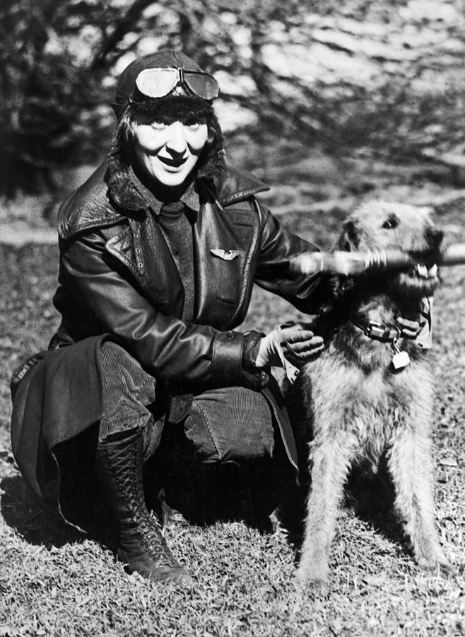 AVIATOR WITH DOG, c1922 Photograph by Granger - Pixels