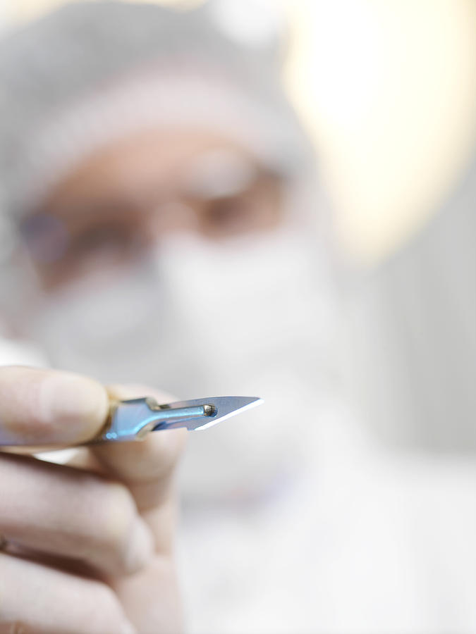 Scalpel by Tek Image / Science Photo Library